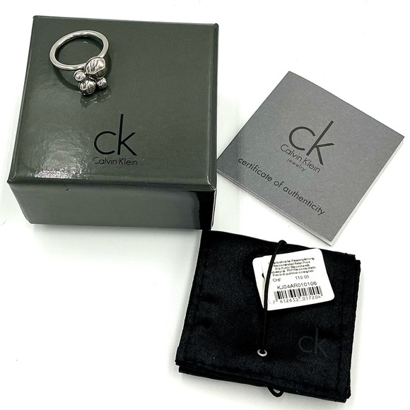 Calvin Klein | Jewelry | Calvin Klein Sterling Silver Spinner Ring 78 ...